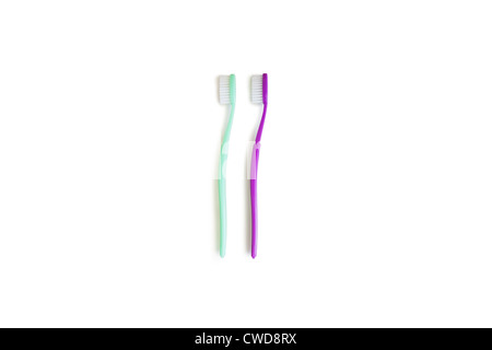 Two toothbrushes over white background Stock Photo - Alamy