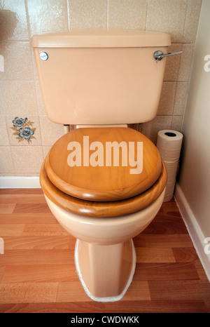 Old style toilet with wooden seat from the Thomas Crapper Collection ...