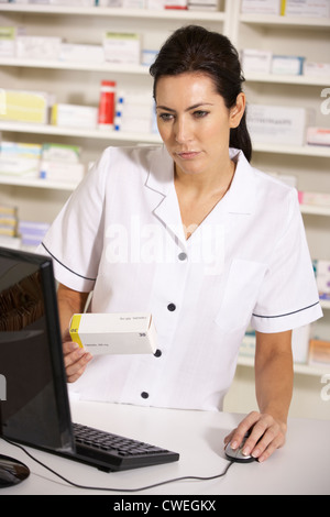 Pharmacist using computer Stock Photo - Alamy