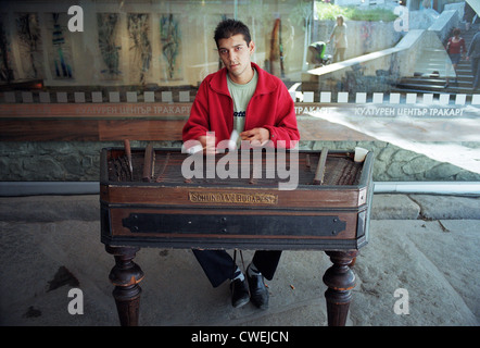 Hungarian gypsy playing cimbalom. Instrument often used in Hungarian ...