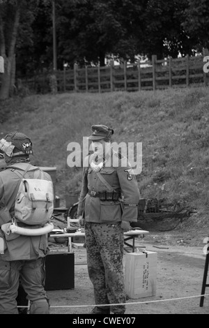 German officer with smile talking to American soldier Stock Photo - Alamy