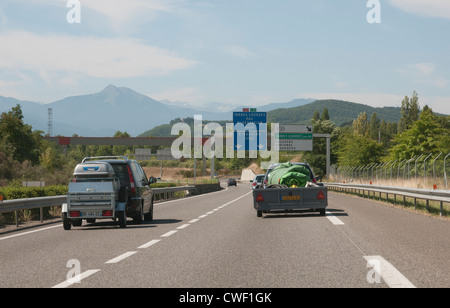 French motorway vehicles towing trailers A64 E80 highway France Stock ...