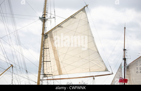 Old ship yard arm square rigging. Sailing ship's furled canvas sails ...