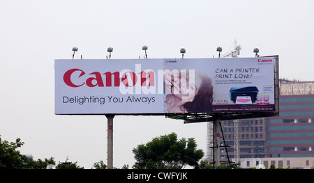 canon Advertising poster on road Stock Photo - Alamy