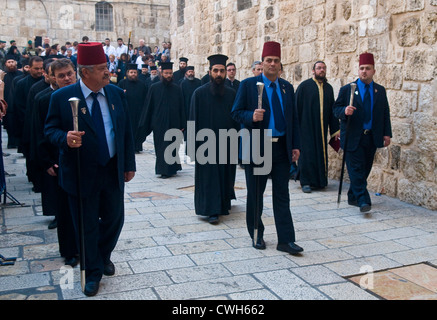 Greek Orthodox monks takes part in the Good Friday procession in ...
