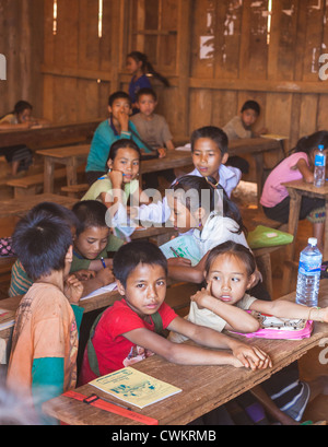 Lao school children in classroom beneath Buddhist temple, 4000 Islands ...