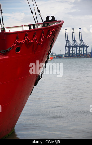 A bright red lighthouse, Lightship / Light Ship Vessel moored at ...
