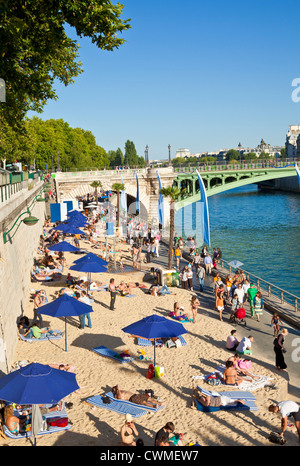 Paris plage or paris beach at the side of the River Seine Paris France ...