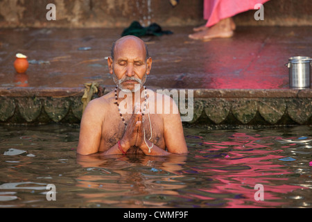 Bathing in the Ganges River in Varanasi India Stock Photo - Alamy