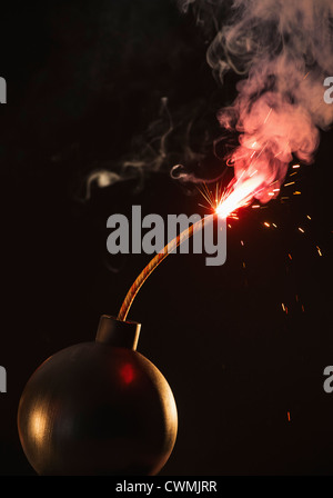 Old-fashioned explosive device ready to go off Stock Photo - Alamy