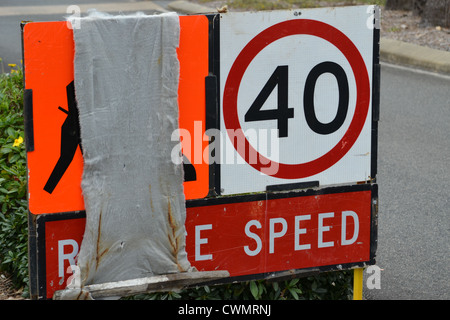 Construction ahead, reduce speed to 40kmph sign Stock Photo - Alamy