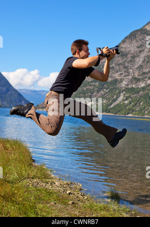 Photographer in Action Stock Photo - Alamy