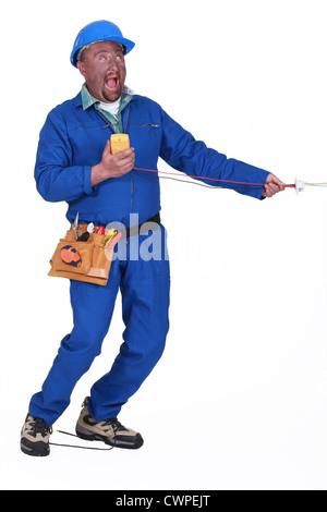 Electrocuted man with burnt face and wires at home Stock Photo - Alamy