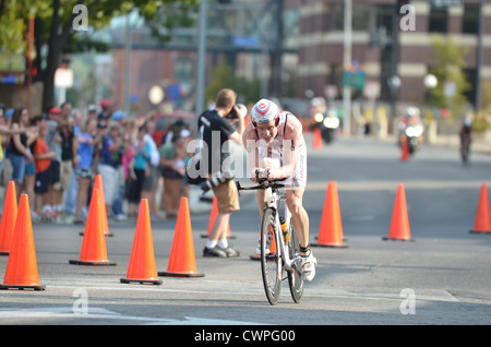 Ben Collins of the US during the bicycle portion of the 2012 Hy-Vee ...