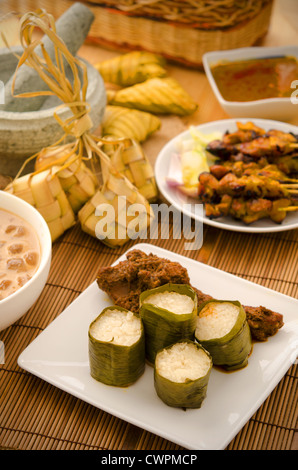 Lemang, rendang, curry chicken for Hari Raya Stock Photo - Alamy