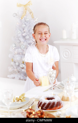 Beautiful table setting with Christmas balls and cookie cutters on ...