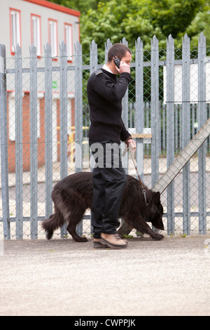 Security guard, walkie talkie and safety officer man outdoor for ...