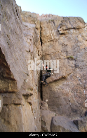 Motion blurred rock climber falling down Stock Photo - Alamy
