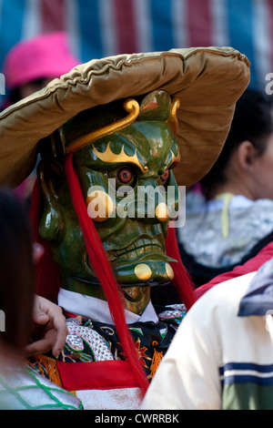 A mask of a taoist god at the "Pigs of God" festival around Chinese New ...
