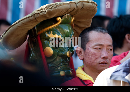 A mask of a taoist god at the "Pigs of God" festival around Chinese New ...