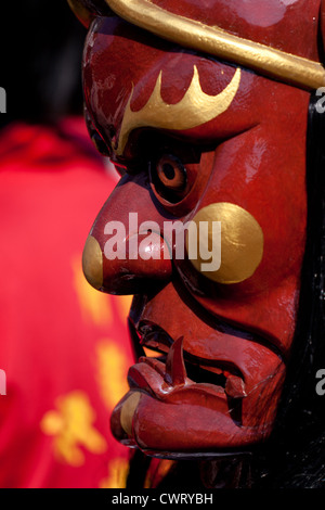 A mask of a taoist god at the "Pigs of God" festival around Chinese New ...