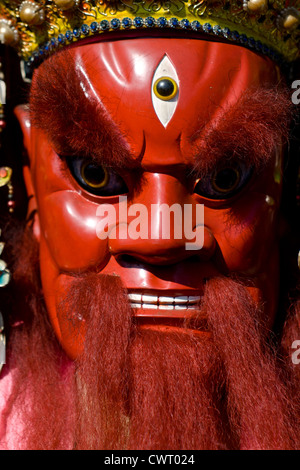 A mask of a taoist god at the "Pigs of God" festival around Chinese New ...