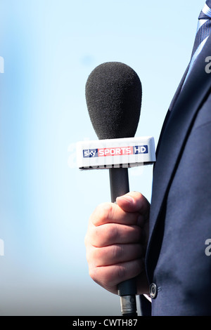 A Sky Sports reporter holds a Sky Sports HD microphone during a live ...