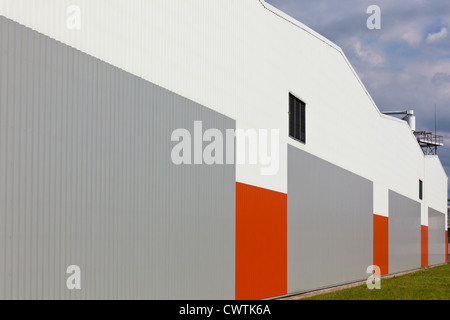 Brightly colored industrial warehouse exterior wall as background Stock ...
