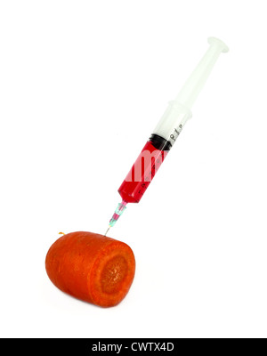 Carrot Injection (with green) isolated on white background Stock Photo ...