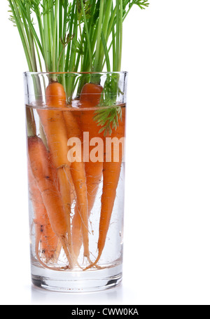 Image of fresh carrots on white background Stock Photo - Alamy