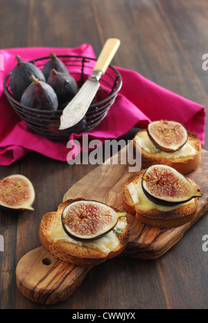 Toast of fig and cheese Stock Photo - Alamy