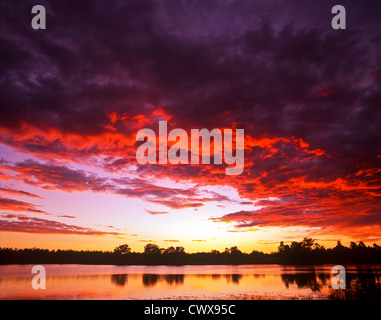 A stunning sunset over Rainbow Lake near Show Low, Arizona. Fourth of ...