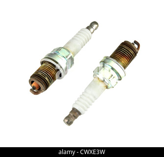 old burned spark plug on white background Stock Photo - Alamy