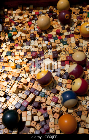 Dice and billiard balls. Still life, frame full of various types of ...