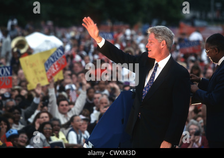 President Bill Clinton waves to his supporters during a campaign stop ...