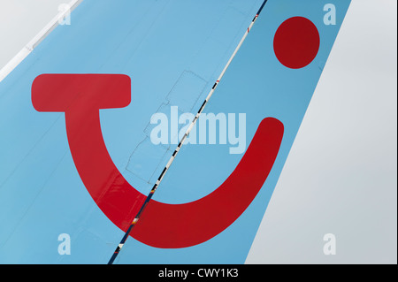 Tail fin of a Tui (Thomson) aircraft showing logo Stock Photo - Alamy