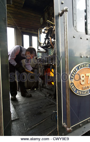 Stoking boiler on steam train. North Yorkshire Moors Railway Stock ...