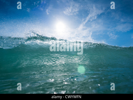 A sea wave photographed at water level, at Waimea Bay on Oahu's north ...