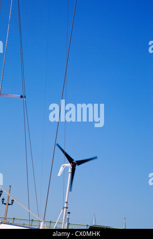 Wind turbine on a small boat Stock Photo - Alamy