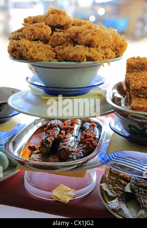 Traditional Sumatran food displayed in a restaurant in Bali Stock Photo ...