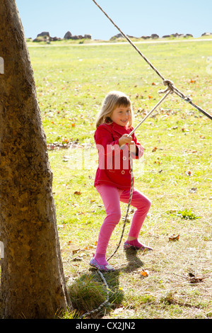 little girl pulling a rope Stock Photo - Alamy