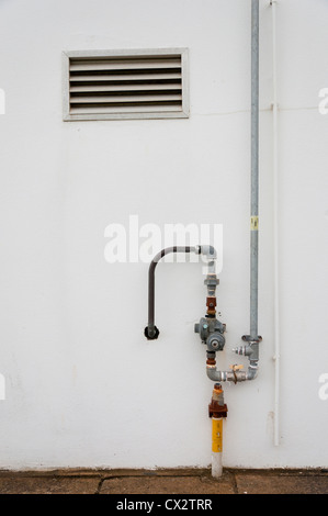gas pipework on exterior wall of a building Stock Photo - Alamy