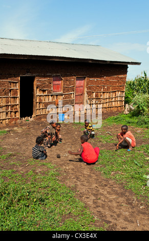 Weliata Sodo Ethiopia Africa Gamo tribe home with children playing game ...