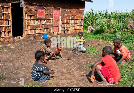 Weliata Sodo Ethiopia Africa Gamo tribe home with children playing ...