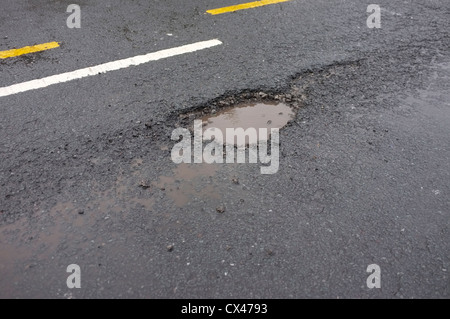 Potholes in roads in Leeds Stock Photo - Alamy