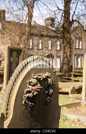 Haworth Cemetery with the Bronte Parsonage in the background Stock ...