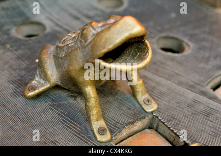 Sapo - a traditional coin-toss game in the andes Stock Photo - Alamy