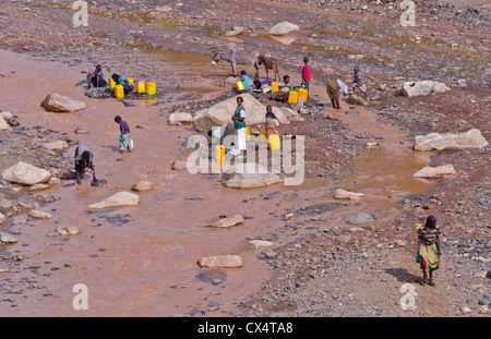 Derashe Ethiopia Africa women getting water from river in mud Derashe ...