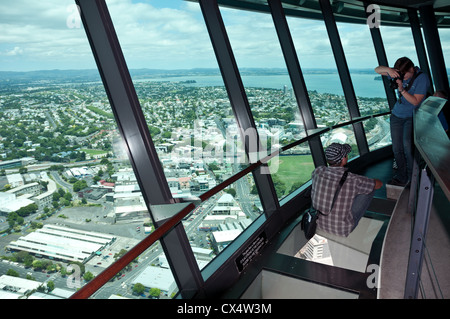 Visitors on the new glass floor in Tower Bridge. One of the bridge’s ...