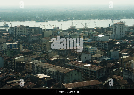 Yangon (Rangoon): Yangon River, rusty ship, port crane, , Yangon Region ...